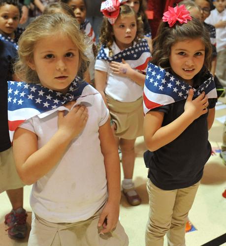 Seventh Ward students honor veterans with song, flags and speeches ...