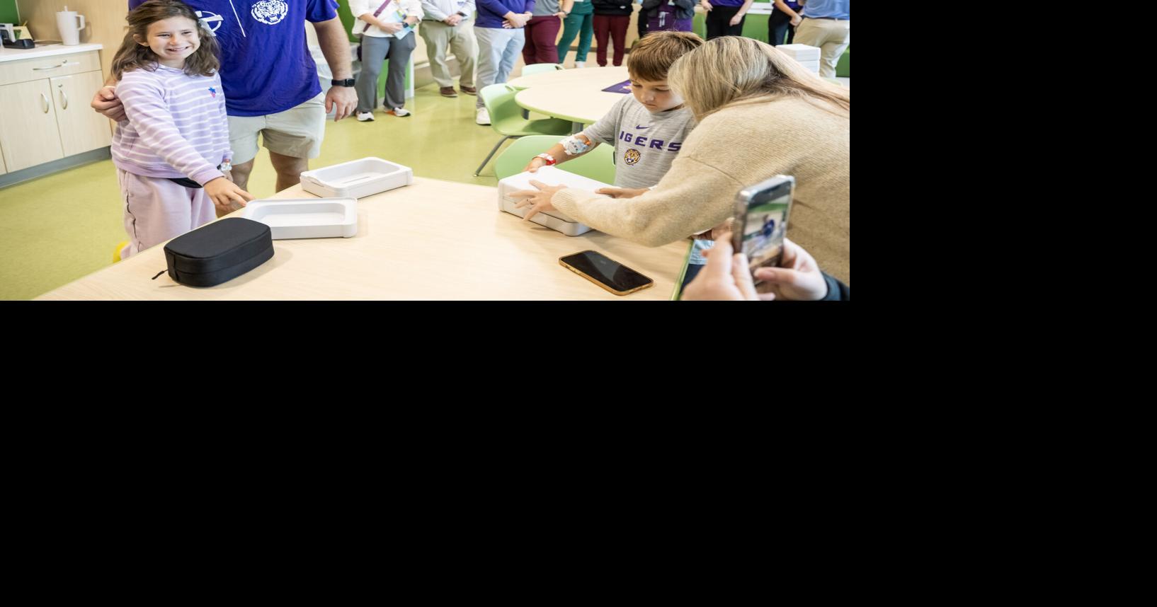 Photos: LSU's Nussmeier brings smiles to OLOL Children's Hospital ...