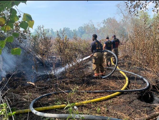 Bayou Sauvage wildfire burns on amid air ground suppression ...