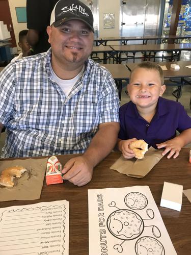 Independence Leadership Academy students enjoy Donuts with Dads ...