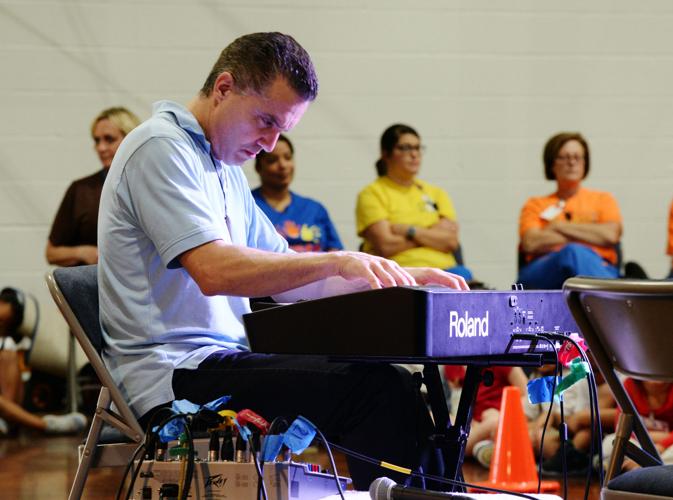 Photos: Composer Eric Genuis performs and speaks at Truman Early ...