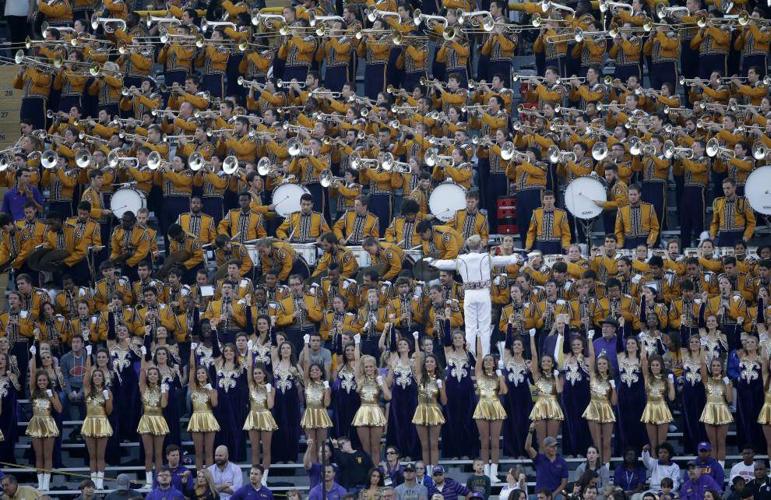 LSU Tiger Marching Band drum major waves goodbye to eventful season ...