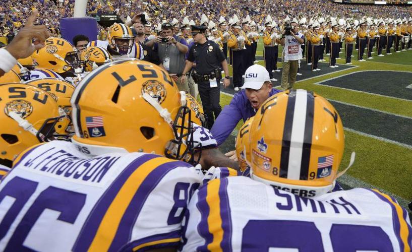Photos: Intense lightning leads to crowded concourses, empty stands ...