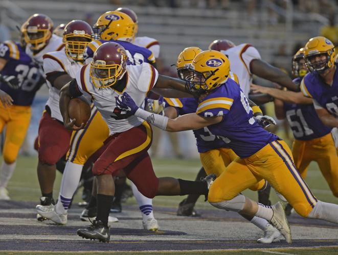 An emotional victory: In its football opener after August's devastating ...