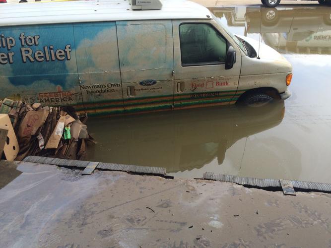 Greater Baton Rouge Food Bank inundated with water, seeks donations ...
