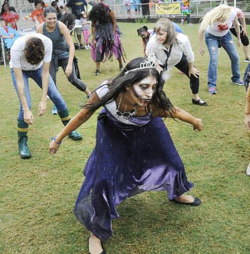 Photos: Friendly ghosts, dancing zombies roll through downtown Baton ...