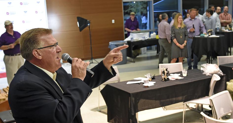 When he's not selling for profit, auctioneer Brian Fourroux sells for ...