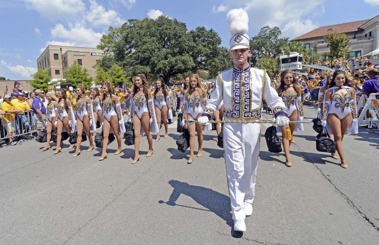 LSU Tiger Marching Band drum major waves goodbye to eventful season ...