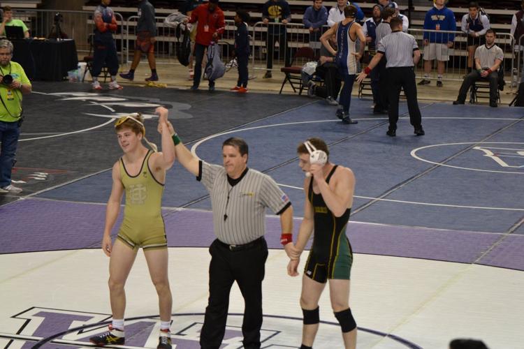 After trio of state wrestling titles this year, Holy Cross' Frost ...