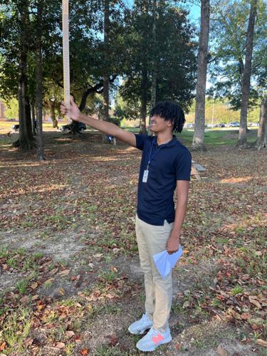 West Feliciana High class learns how to calculate volume of lumber in ...