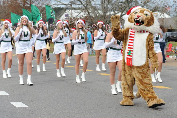 Dark clouds, rain can't stop Walker Christmas parade from rolling ...