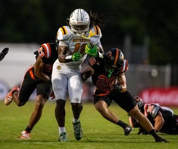 University makes statement with big win over Catholic | High School ...