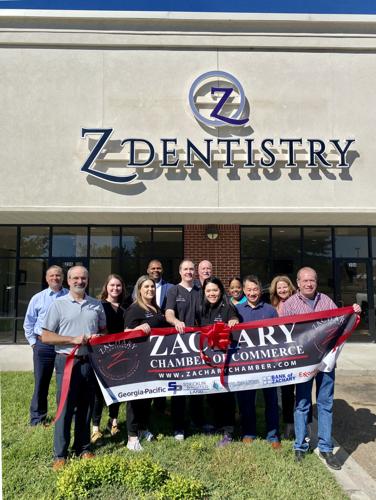 Husband and wife dentists hold ceremony for their practice | Zachary ...