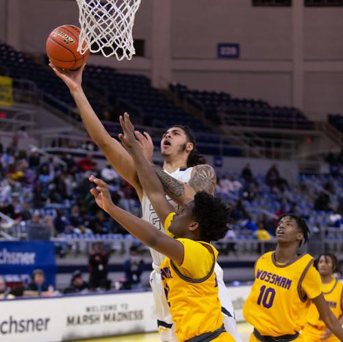 And again: MVP Dez'mond Perkins helps lead Madison Prep by Wossman in ...