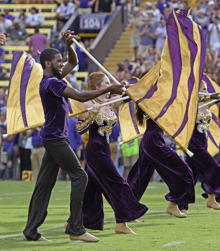 Believed to be first, Morgan City man dances, twirls flag with LSU ...