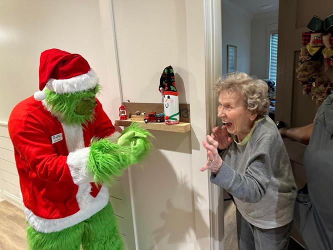 The Grinch and others make a surprise visit to charm residents at The ...