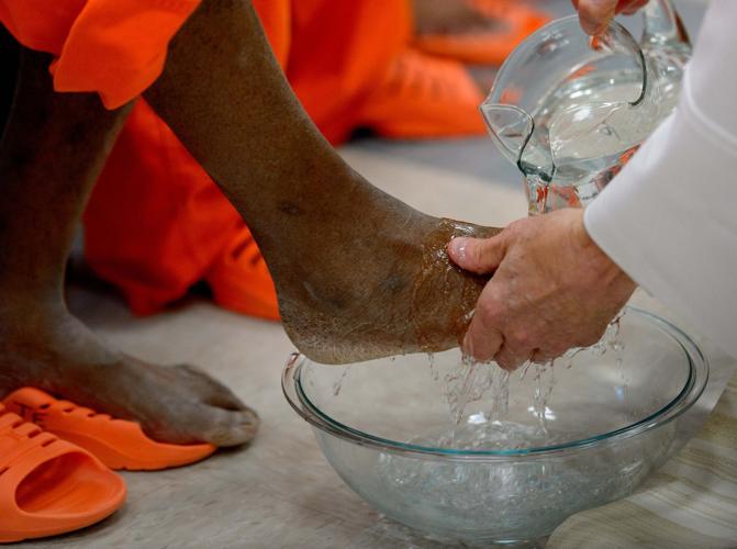 Photos: Archbishop Aymond holds Washing of Feet Service with OPSO ...