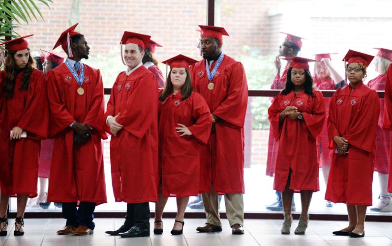 Making history: 343 graduates walk stage in UL-Lafayette's largest ...