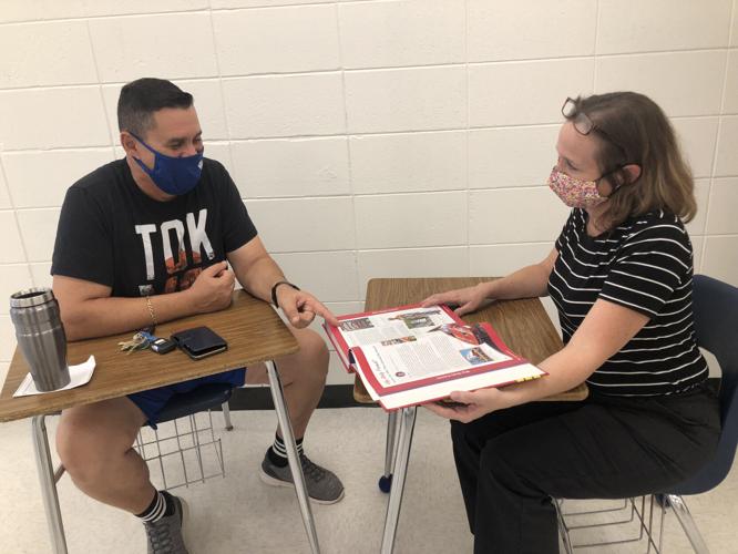 Books, masks and temperature checks, Feliciana students get back on ...