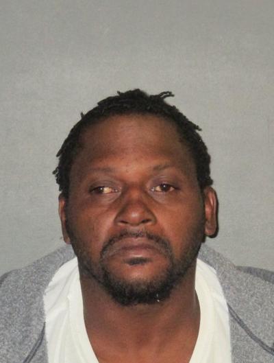 Man suspected of setting house on fire with two people inside turns ...