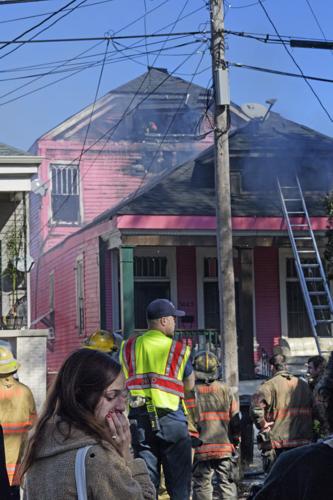 Ten people and their pets displaced by multiple-house fire in Mid-City ...
