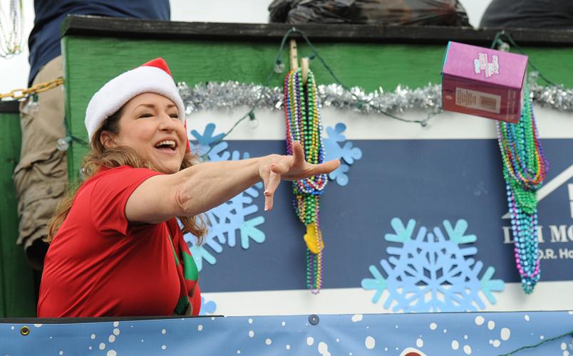 Dark clouds, rain can't stop Walker Christmas parade from rolling ...