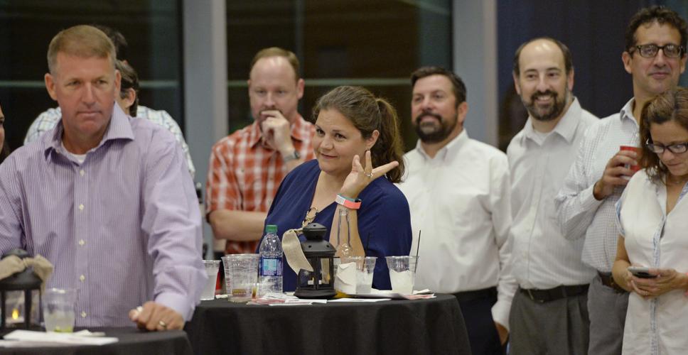 When he's not selling for profit, auctioneer Brian Fourroux sells for ...