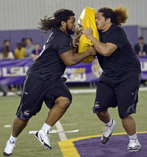 Photos: Benching 100s of pounds, running 40-yard dashes all in a day's ...
