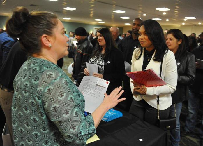 Hundreds crowd Lafayette hotel to interview for jobs at Ambassador Town ...
