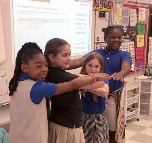 Bains Elementary School English students learn the difference between ...