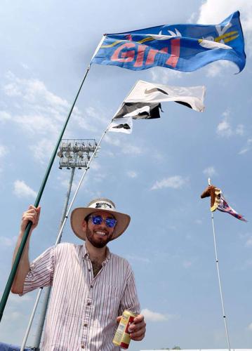 Jazz Fest fans unfurl flags fluttering with creativity | News ...