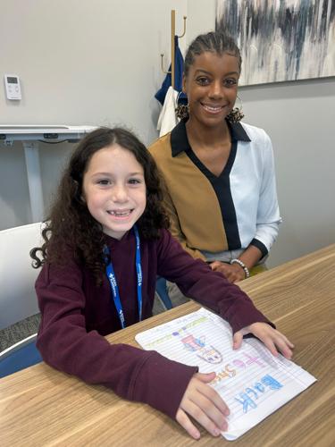 Bains Elementary student reads her own story as class leader | St ...