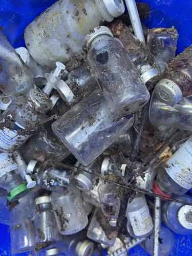 Volunteers clean up large homeless encampment at BREC park | Crime ...