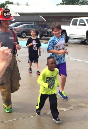 Run for the schools: A little wet, a lot of fun | Zachary | theadvocate.com