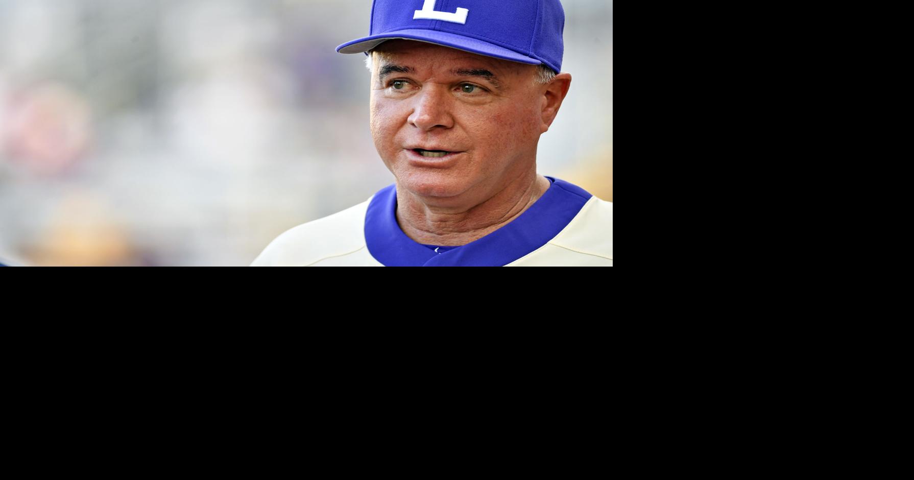 LSU baseball coach Paul Mainieri helps make protective equipment inside ...