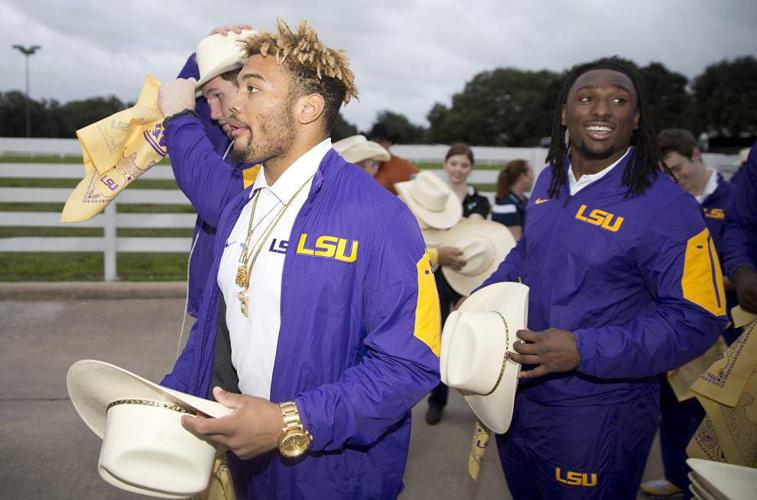 Cowboy hats and rodeo games, LSU Tigers get into Texas spirit during ...