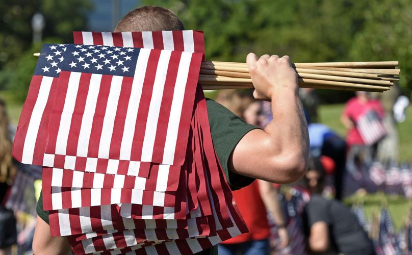 Photos: 11,000 Flags Placed in Front of State Capital Building | Photos ...