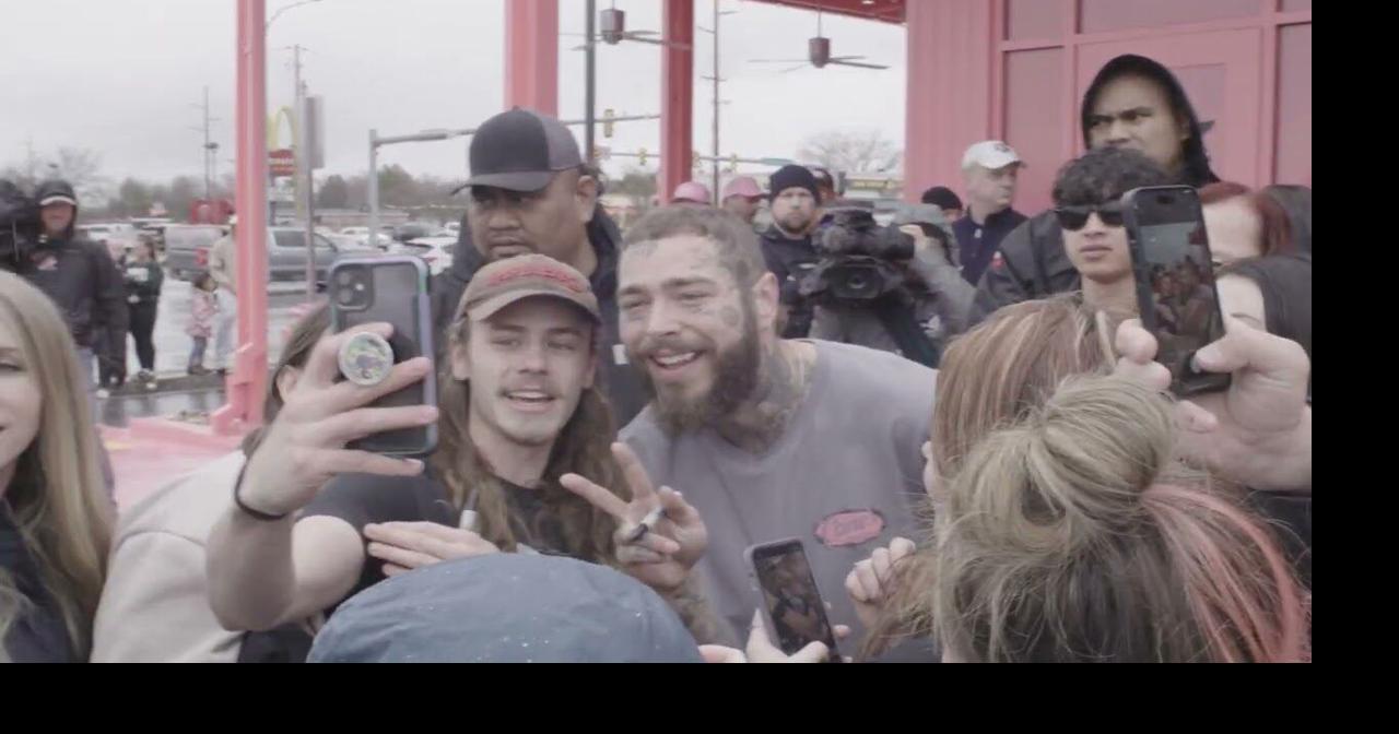Post Malone walks through a Utah Raising Cane's restaurant he custom ...