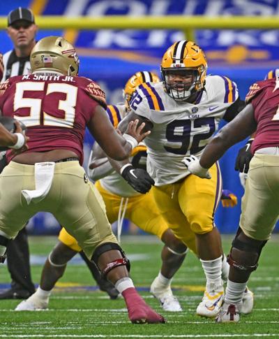 LSU defensive tackle Mekhi Wingo is working to fit into his bigger role ...
