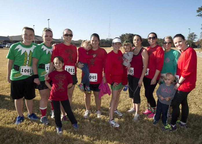 Santa’s ‘elves’ race through the streets of Central in festive 5K run ...