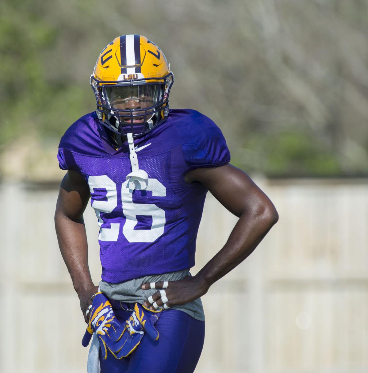 LSU's John Battle — part photographer, part football player — in line ...