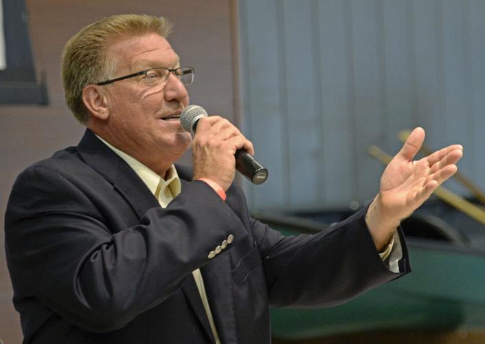 When he's not selling for profit, auctioneer Brian Fourroux sells for ...