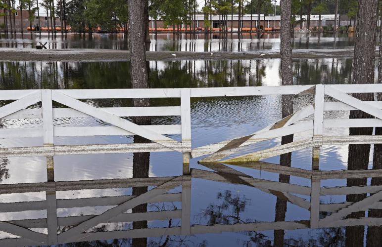 One year after flood: Evacuated inmates restock wares, prison stands ...