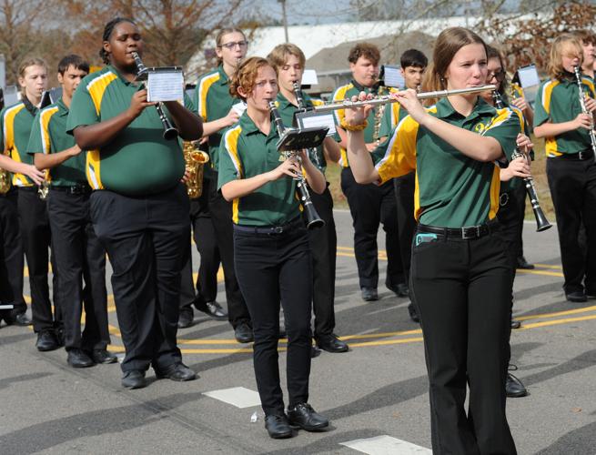 Dark clouds, rain can't stop Walker Christmas parade from rolling ...