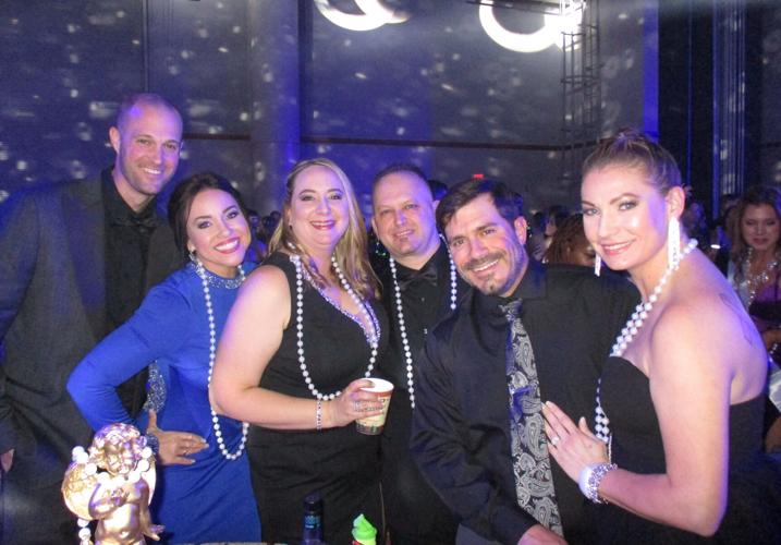 Krewe of Apollo celebrates 47 years of reading 'Between the Covers ...