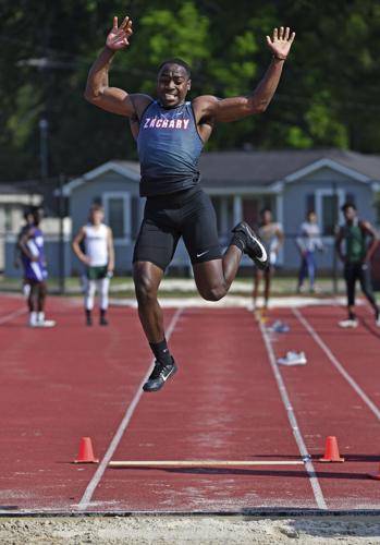 Kenson Tate's record long jump, fast times set tone as Zachary, St ...