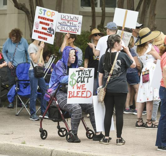 200 rally in Lafayette to protest Trump policies, cuts | News ...