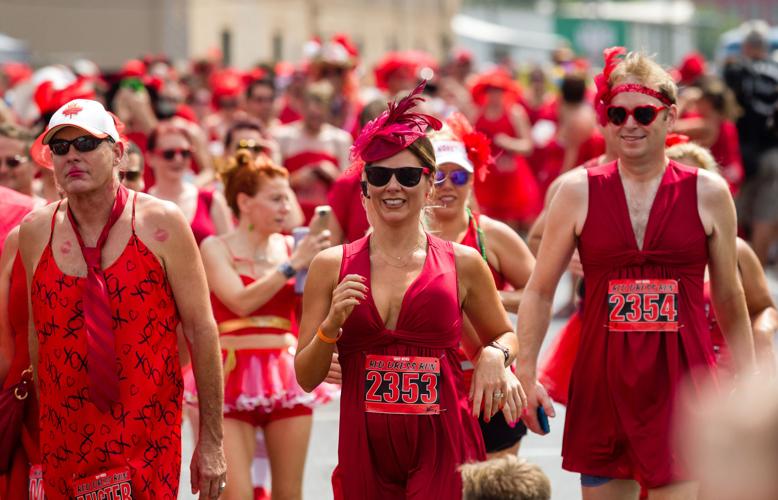 Photos of the week Aug. 7-14: Red dresses, back to school, more ...
