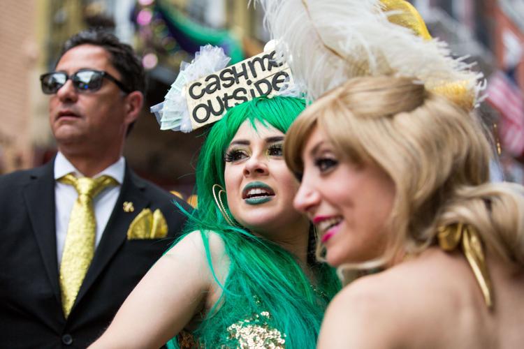 Photos: Annual 'Greasing of the Poles' event kicks off Mardi Gras ...
