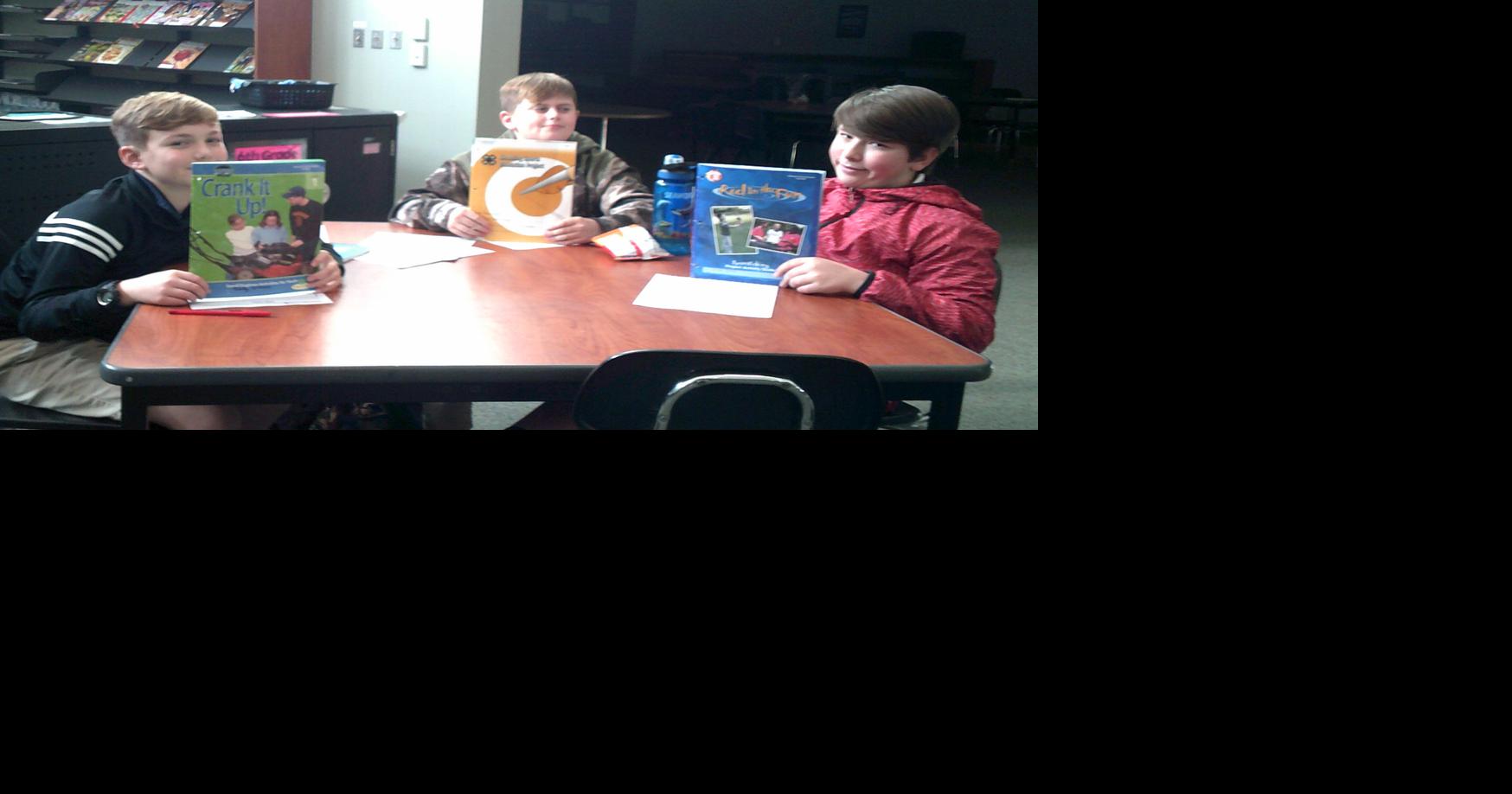 North Corbin Junior High School 4-H members work on project books ...